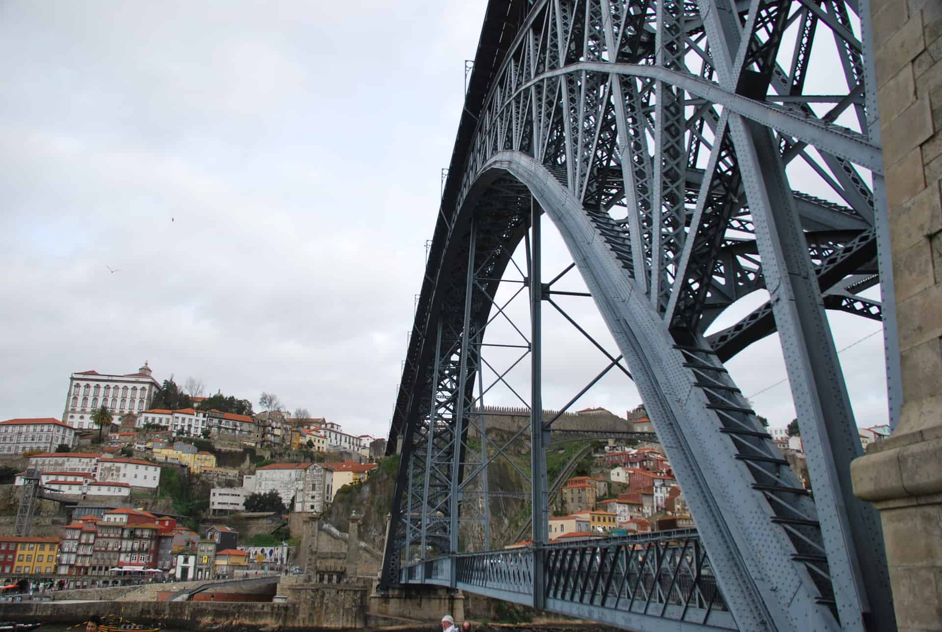 Cross the famous Don Luis I Bridge in Oporto, Portugal